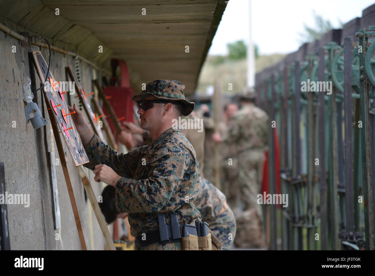 U.S. Marine Corps Sgt. Victor Netta, chief primary marksmanship ...