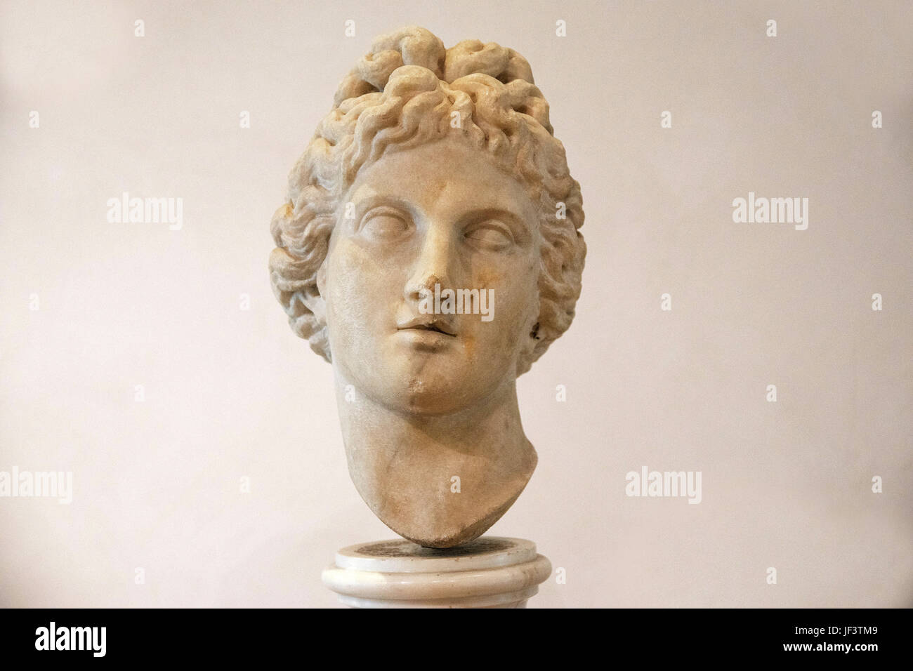 Ancient sculpture of the head of Apollo in the baths of Diocletian ...