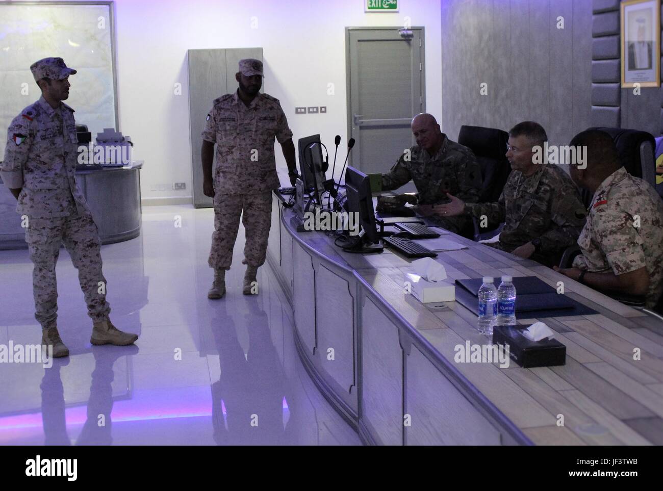 Maj. Sabah and Maj. Hamod, Kuwait Land Forces, brief Lt. Col. Mark ...