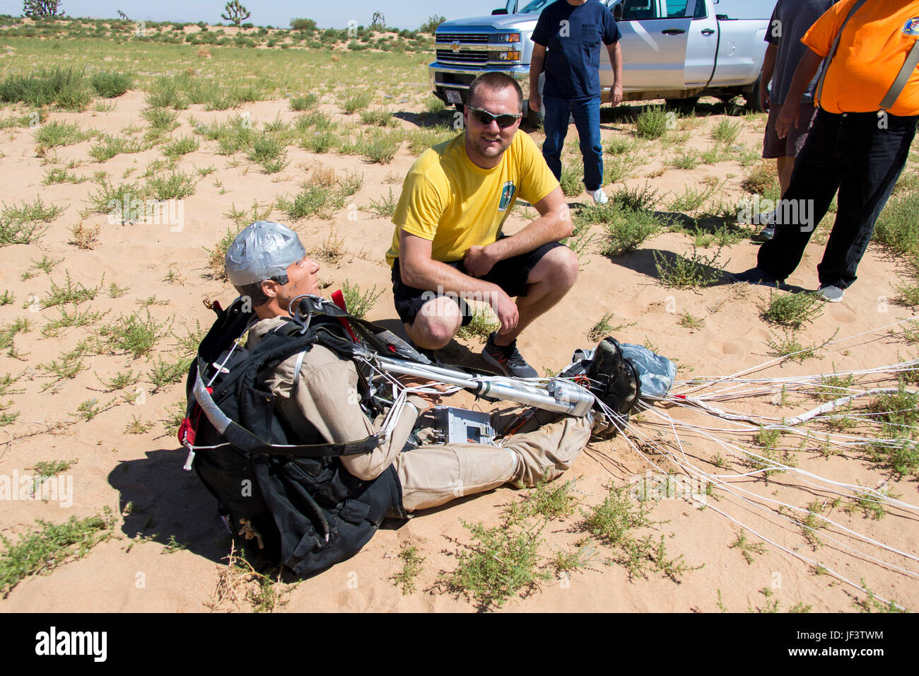 Trever Bush, 412th OSS Parachute Test Team, examines the Remotely ...