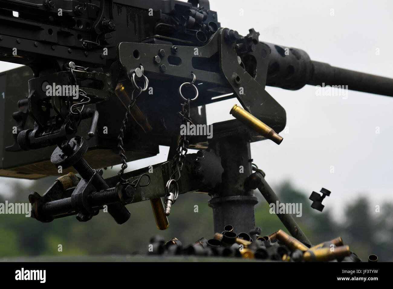 Casings from a M2 machine gun are released during weapons firing at ...