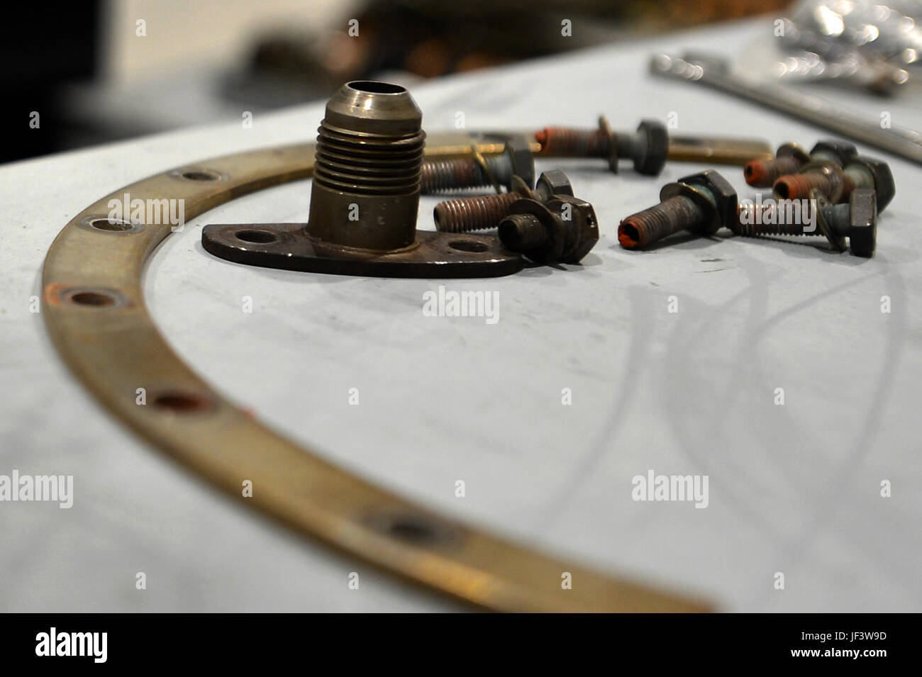 Various bolts are placed on an A/M32A-60 generator in the 20th ...