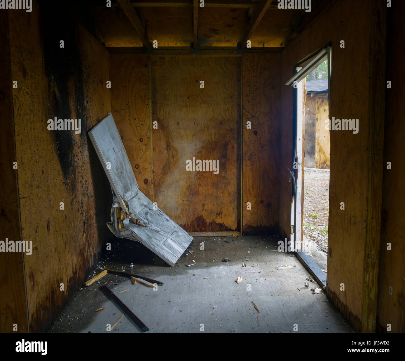 Marines use a water charge to breach a door during an urban breaching ...