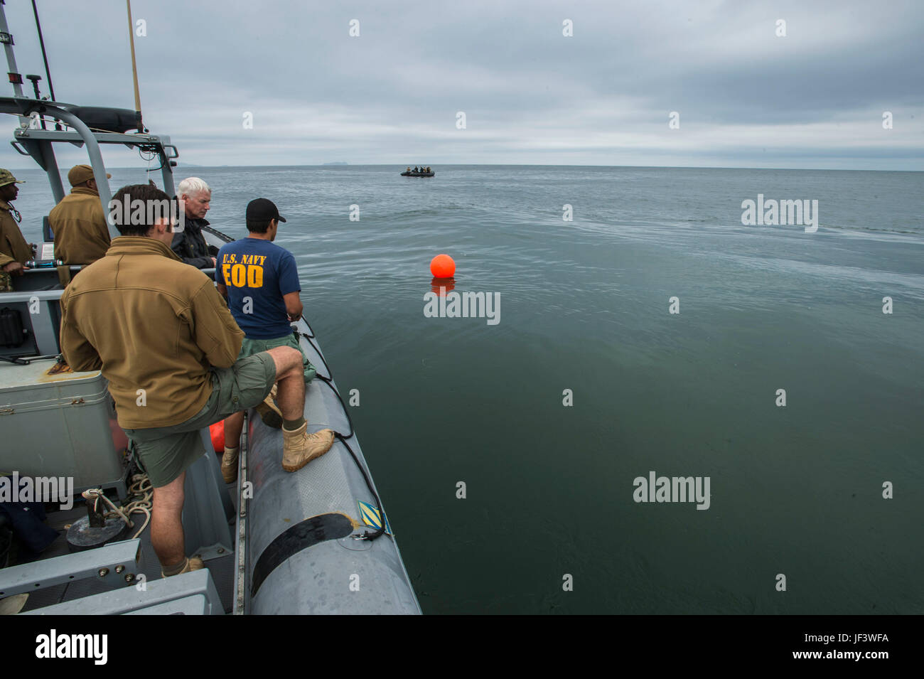 U.S. Navy Sailors assigned to Explosive Ordnance Disposal Group One ...
