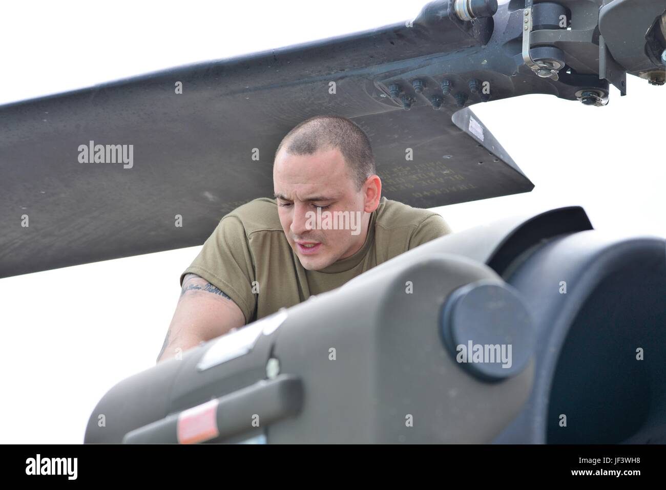 U.S. Army Sgt. Jaime Anaya, a UH-60 Black Hawk crew chief (15T military ...