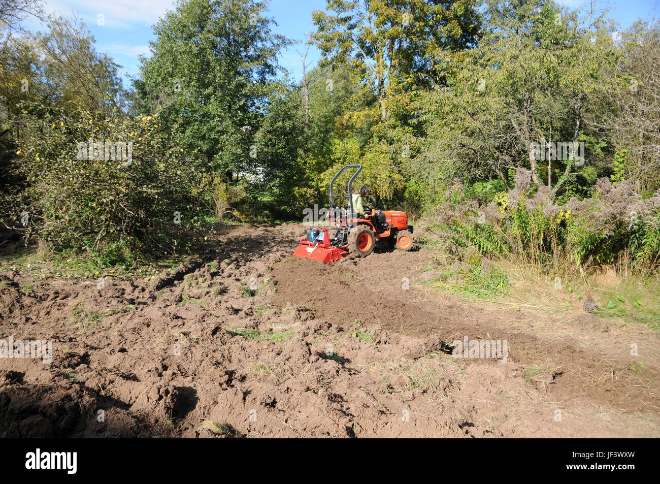 Tilling the soil hi-res stock photography and images - Alamy