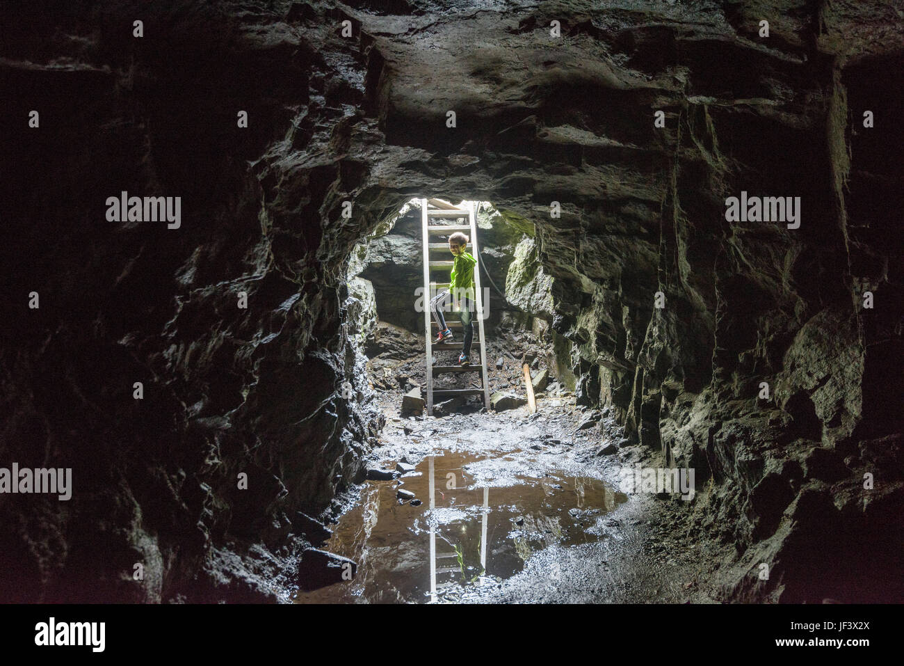 Person in cave hi-res stock photography and images - Alamy