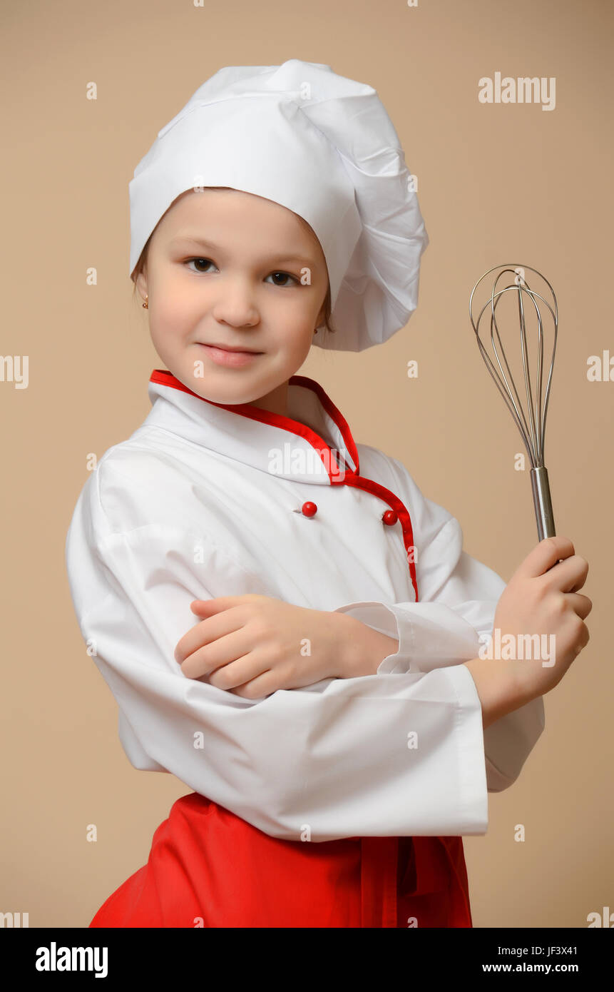 Little cook girl Stock Photo - Alamy