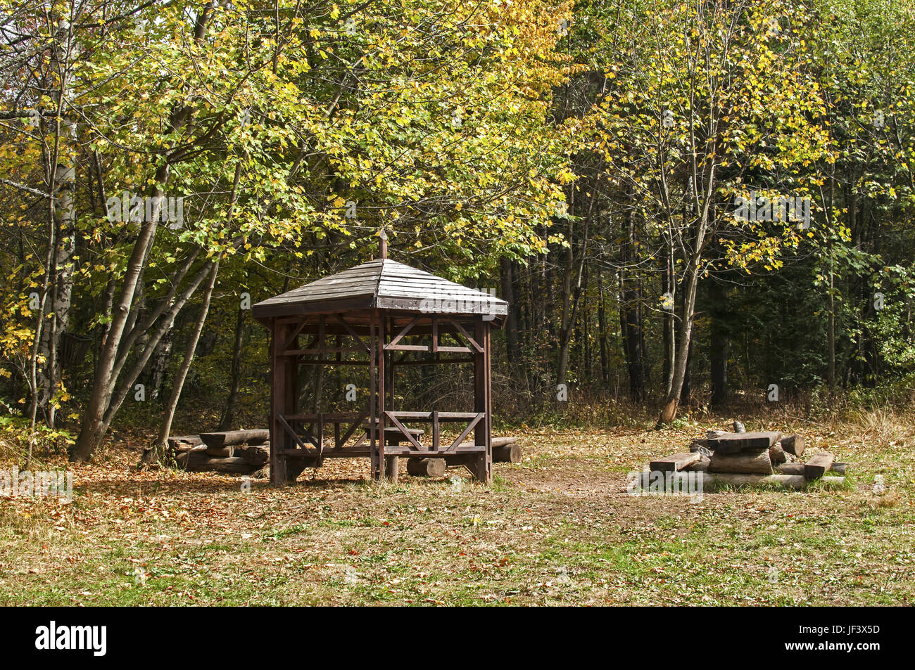 Wooden pavilion in mountain park Stock Photo - Alamy