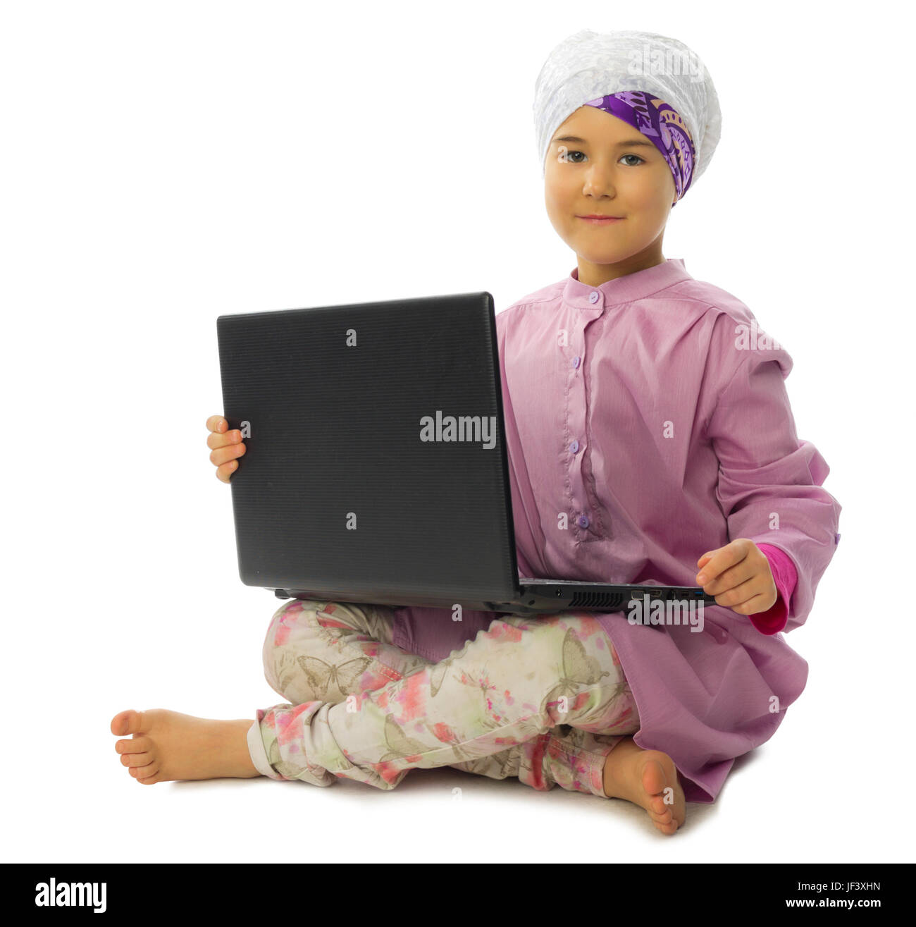 Little muslim girl isolated on white Stock Photo - Alamy