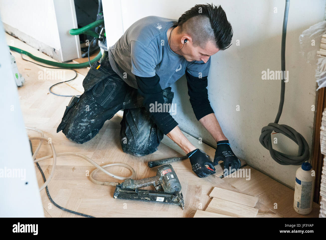 Man renovating house Stock Photo - Alamy