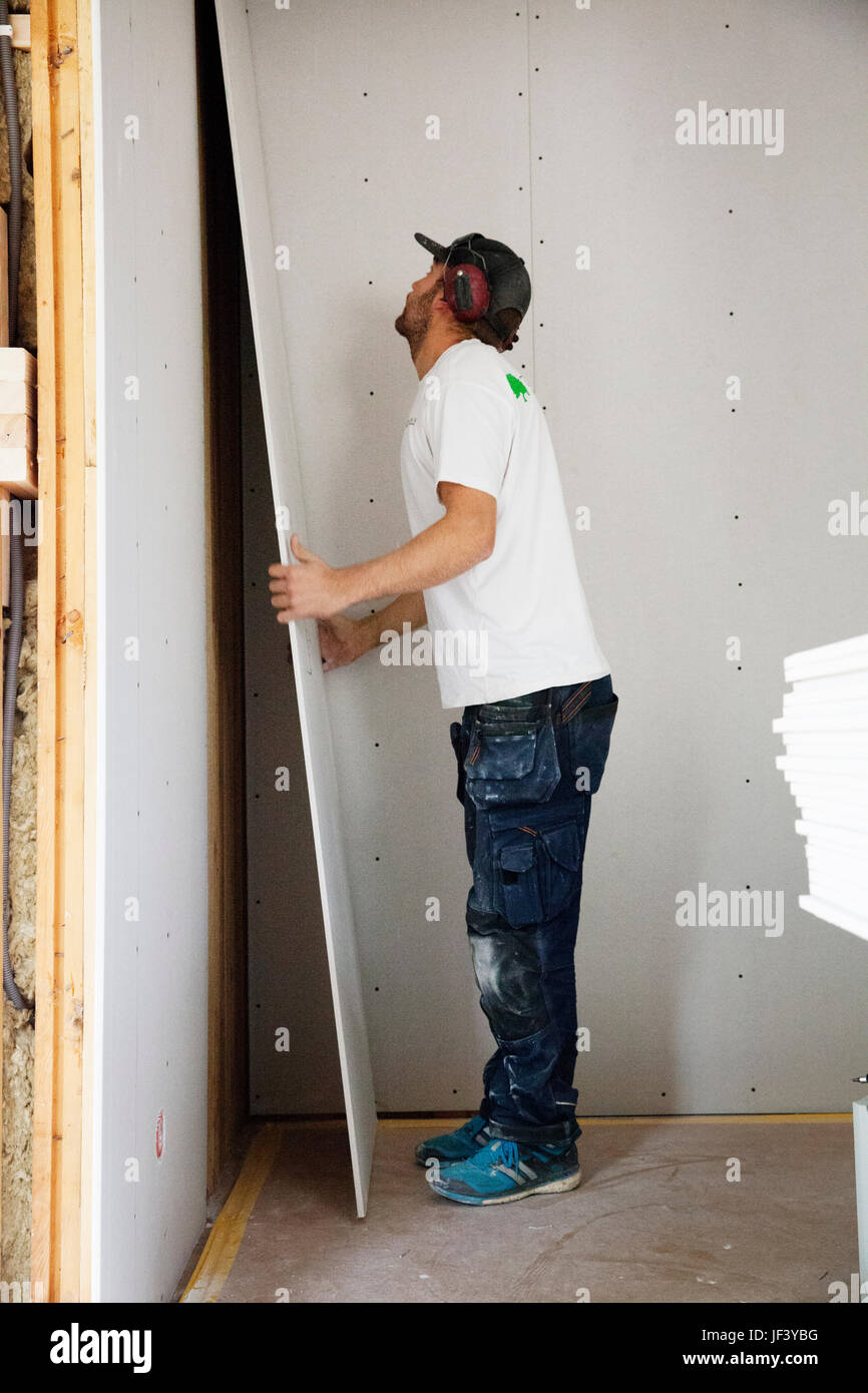 Man renovating house Stock Photo - Alamy