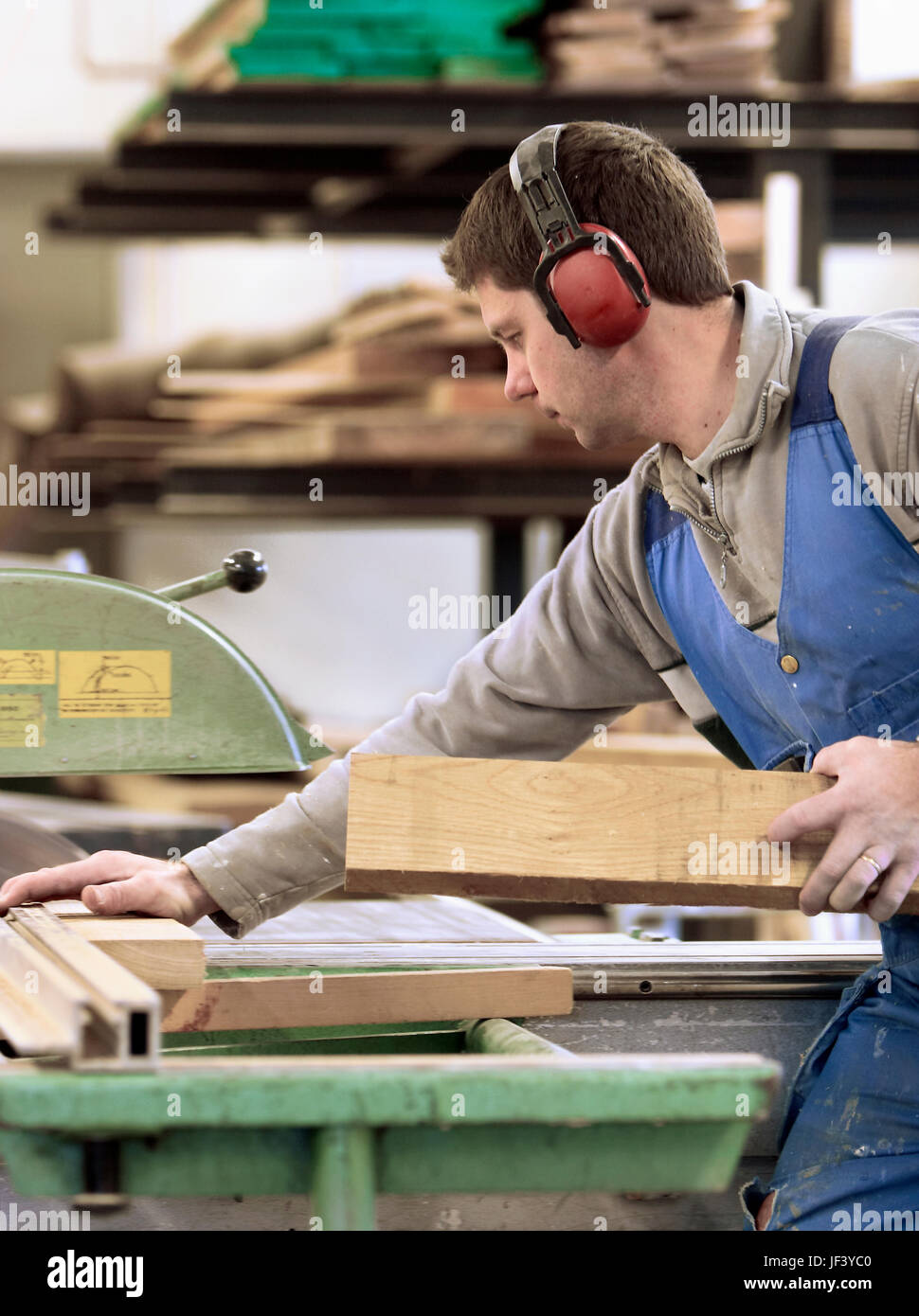 Man working in workshop Stock Photo - Alamy