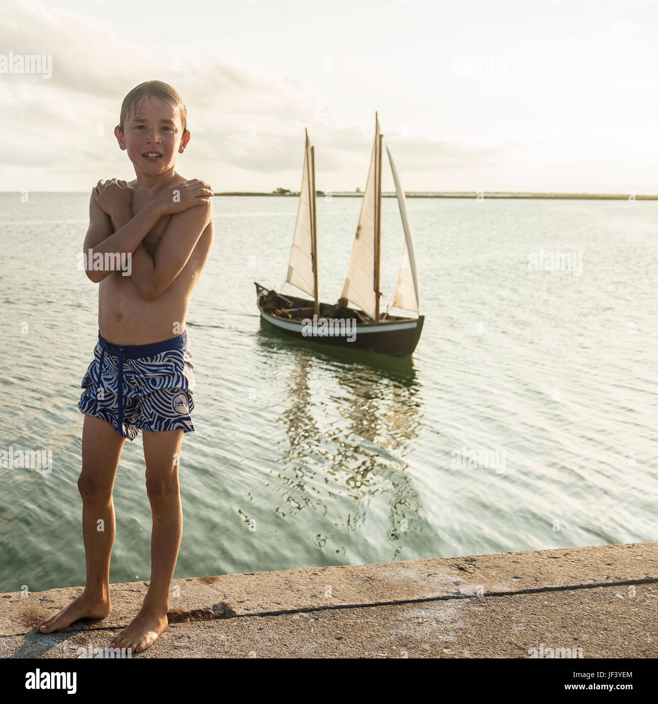 Boy at sea Stock Photo - Alamy
