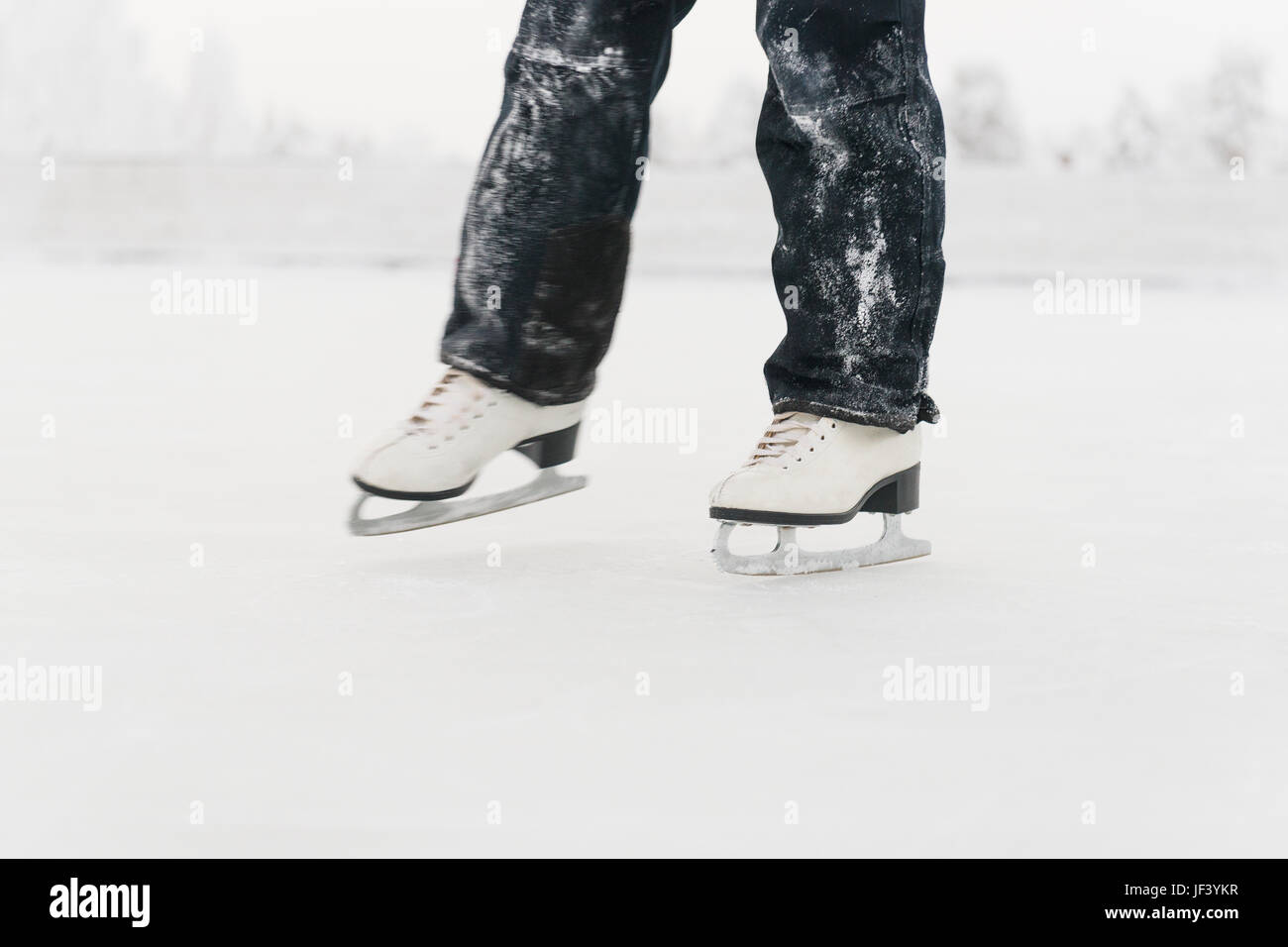 Person ice skating Stock Photo - Alamy