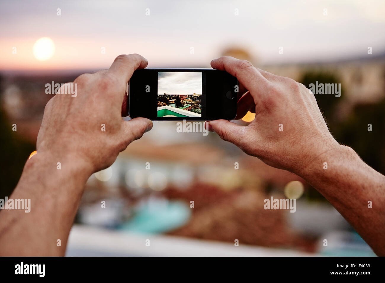 Photographing with cellphone, close-up Stock Photo - Alamy