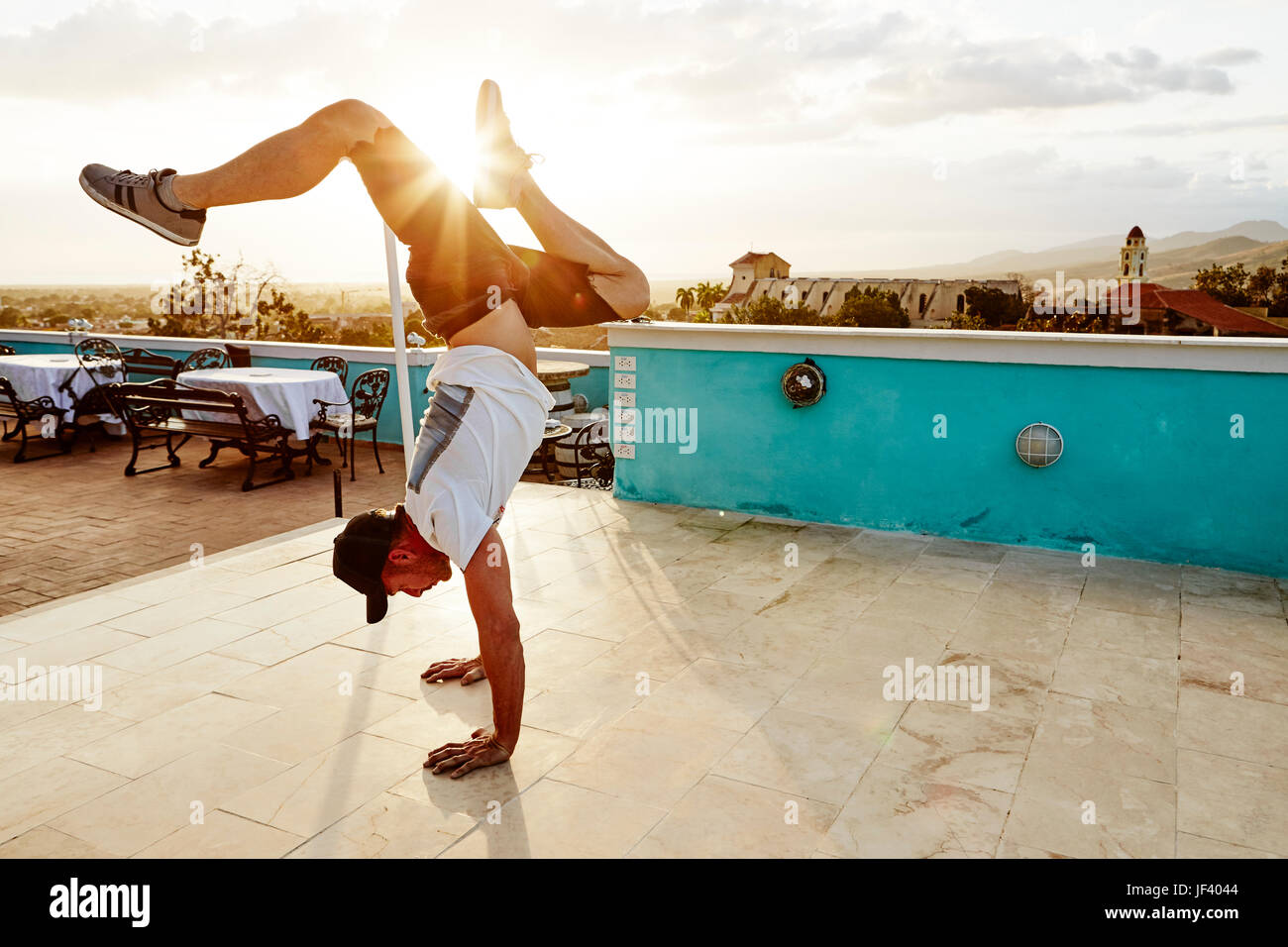 Man doing handstand Stock Photo - Alamy