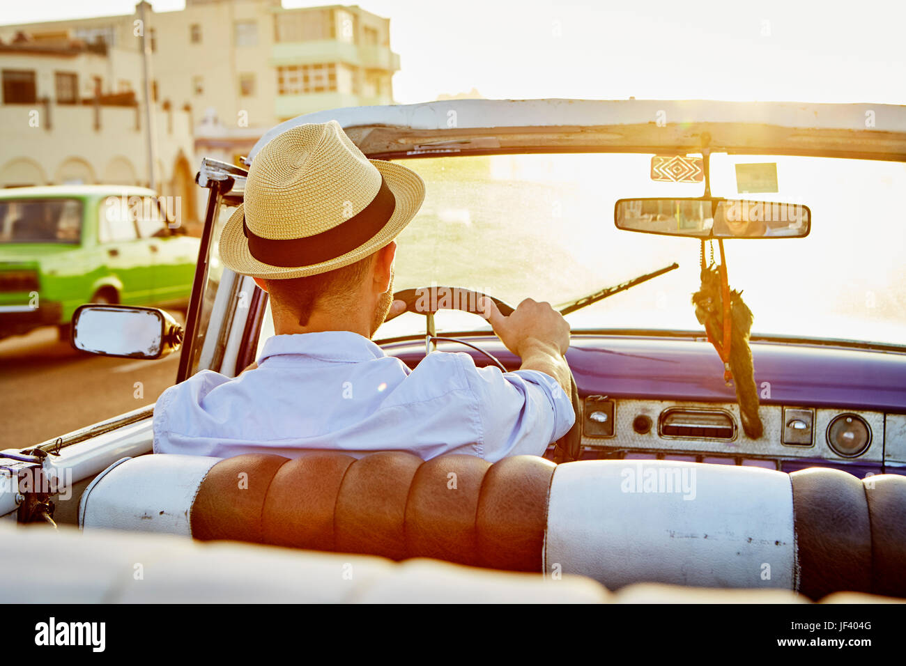 Man driving convertible car Stock Photo - Alamy