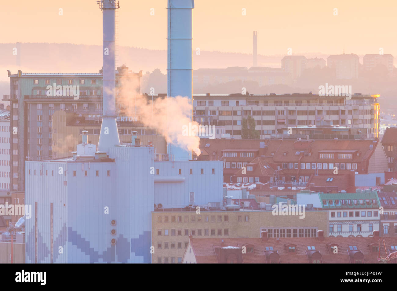 Factory building in city Stock Photo - Alamy