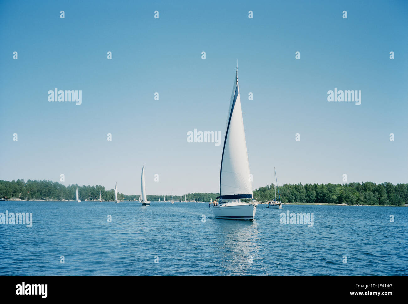 Sailing boats on water Stock Photo - Alamy