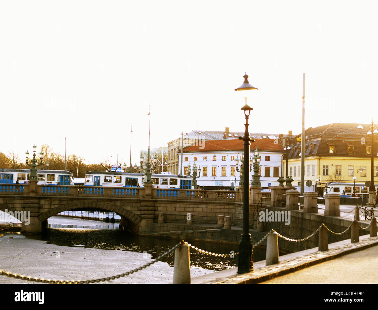 Tram passing through bridge Stock Photo - Alamy