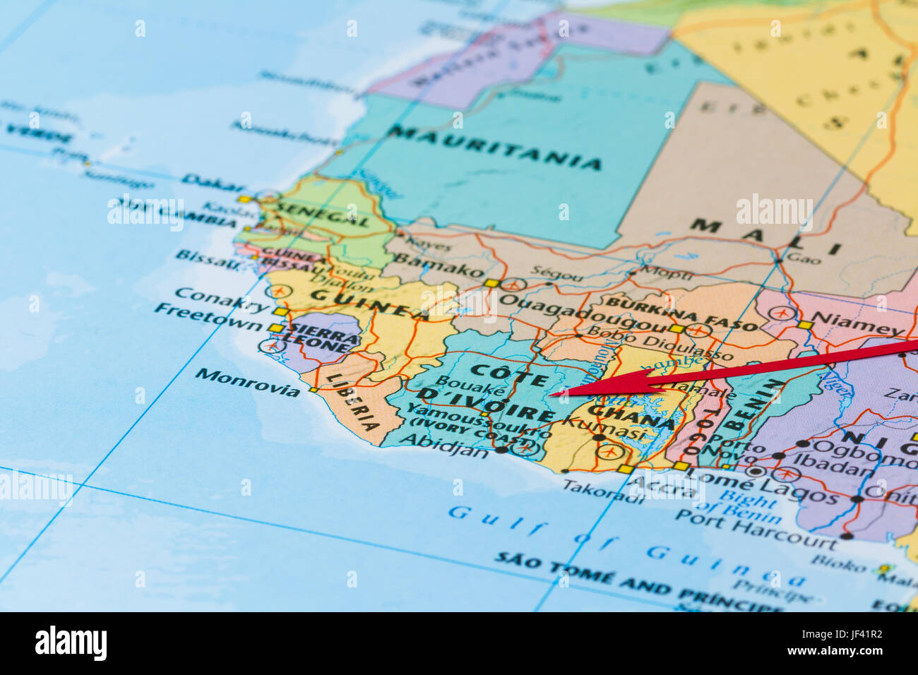 Photo of Ivory Coast (Cote d'Ivoire). Country indicated by red arrow ...