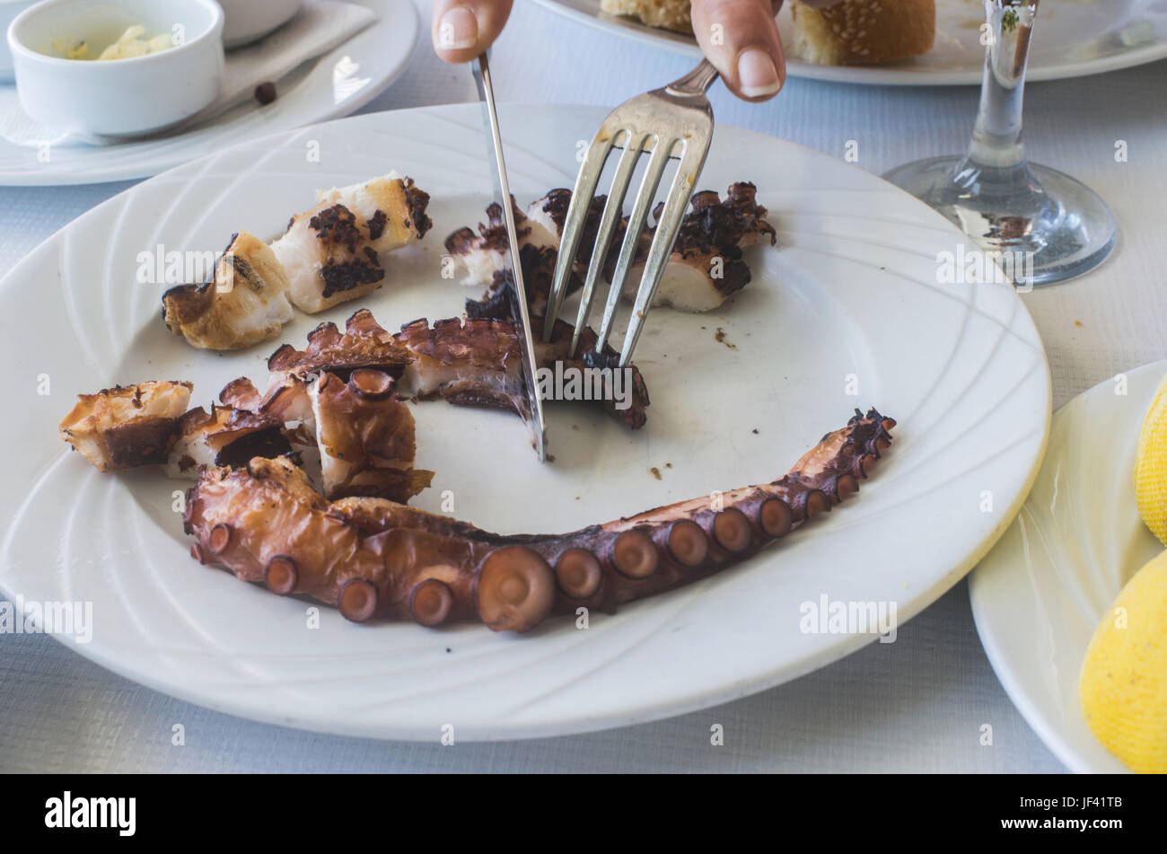 Octopus in a Greek restaurant Stock Photo - Alamy