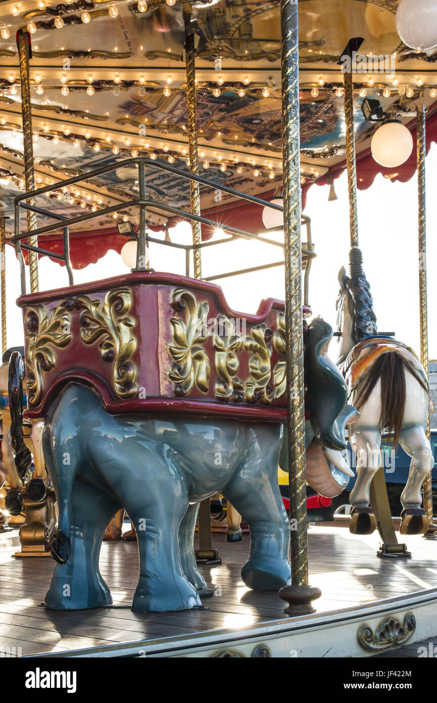 Carousel in amusement park Stock Photo - Alamy