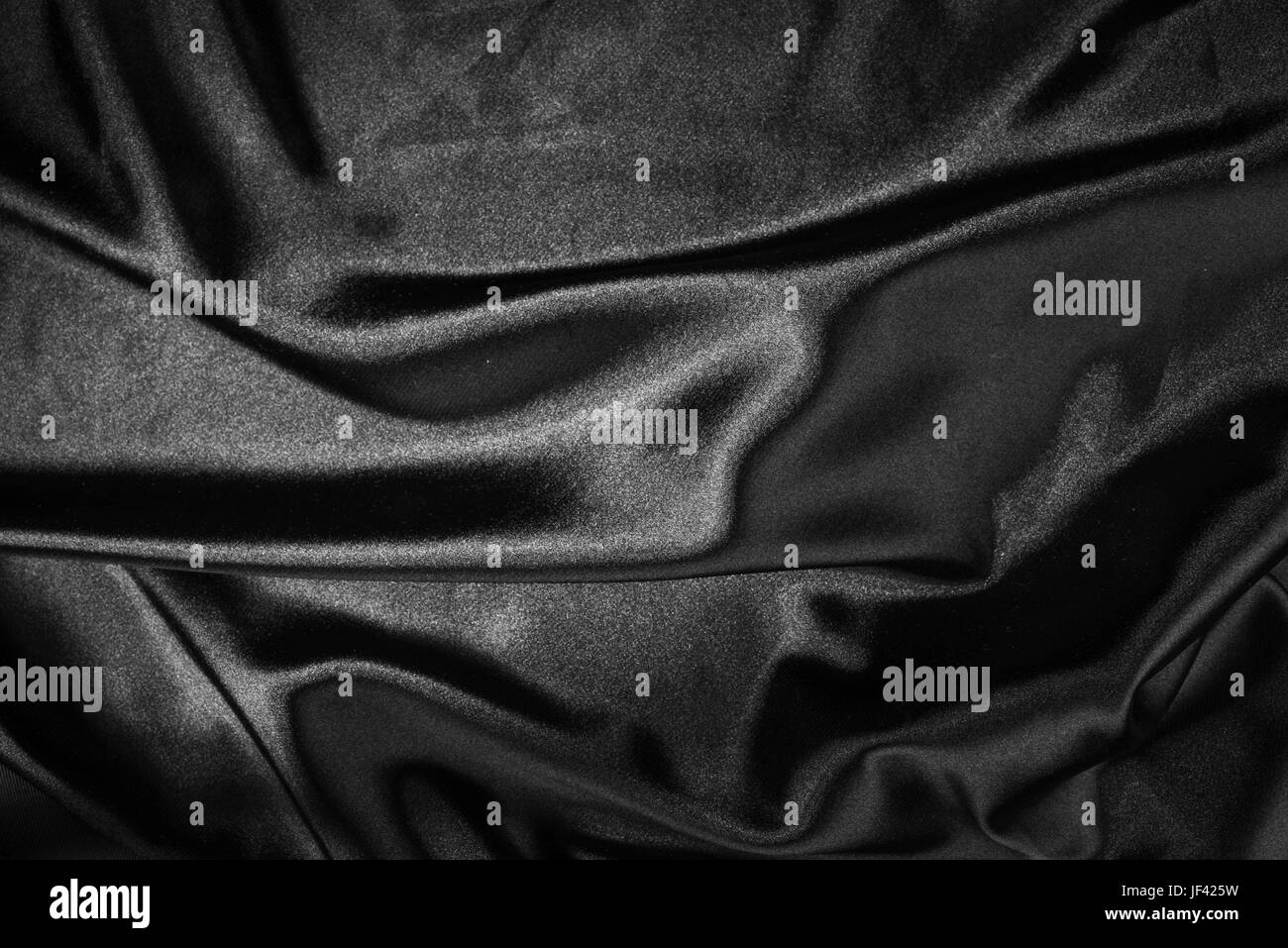 Shiny black satin fabric Stock Photo - Alamy