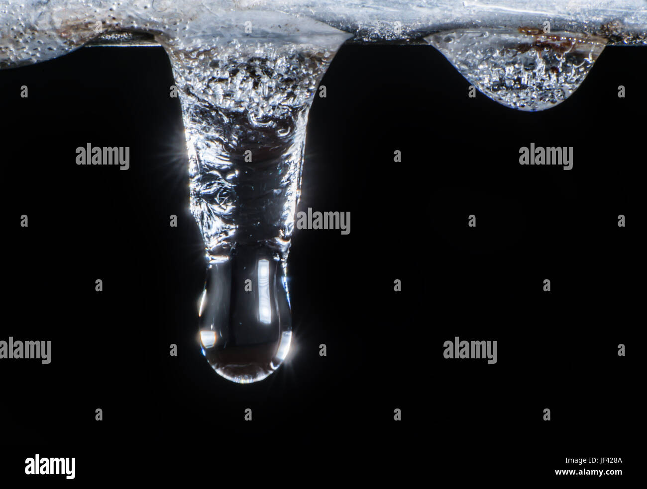 Icicles and drop water Stock Photo - Alamy