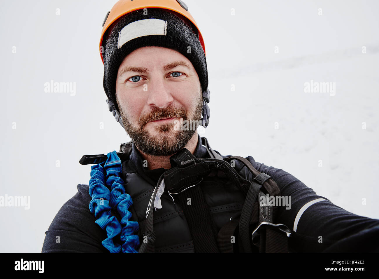 Portrait of smiling climber Stock Photo - Alamy