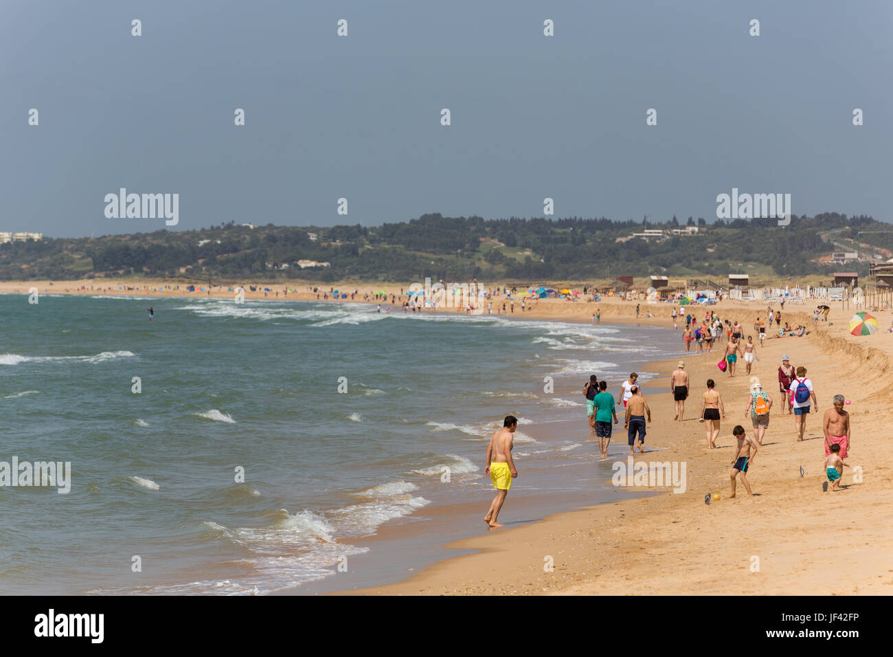 ALVOR, PORTUGAL - APRIL 23, 2017: People at the famous beach of Praia ...