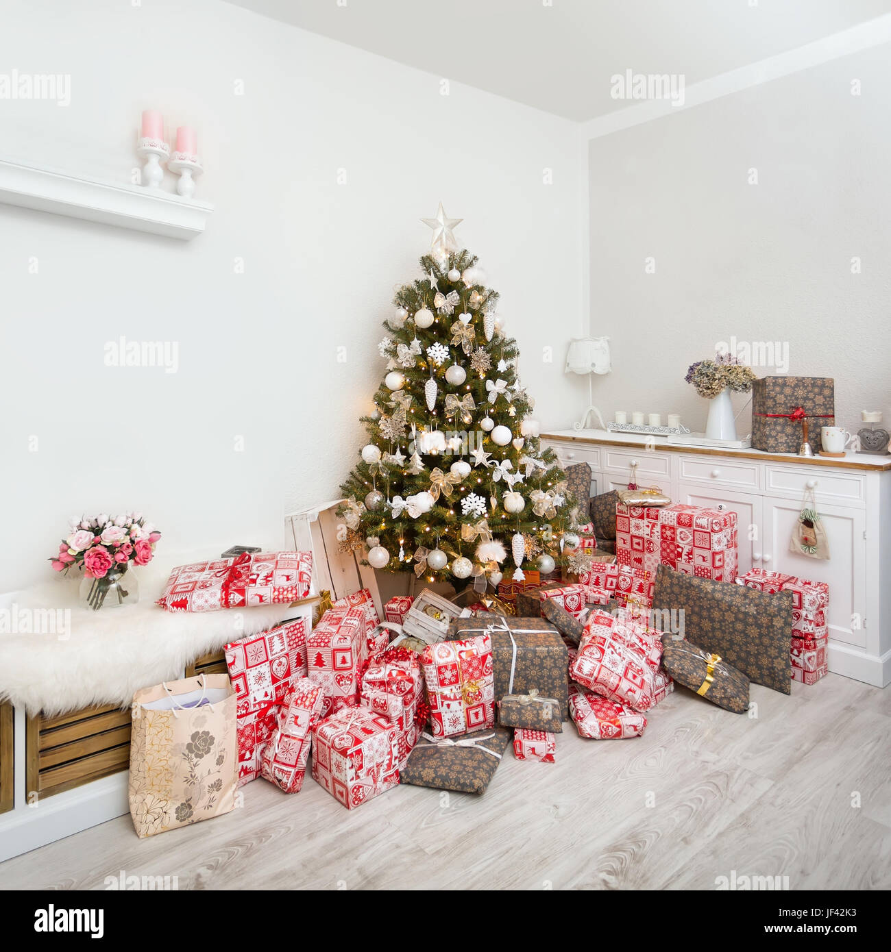 Christmas tree in living room Stock Photo - Alamy