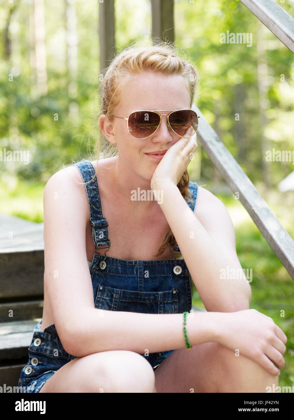 Girl looking at camera Stock Photo - Alamy