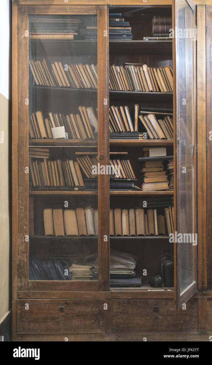 Old books in a vintage library Stock Photo - Alamy