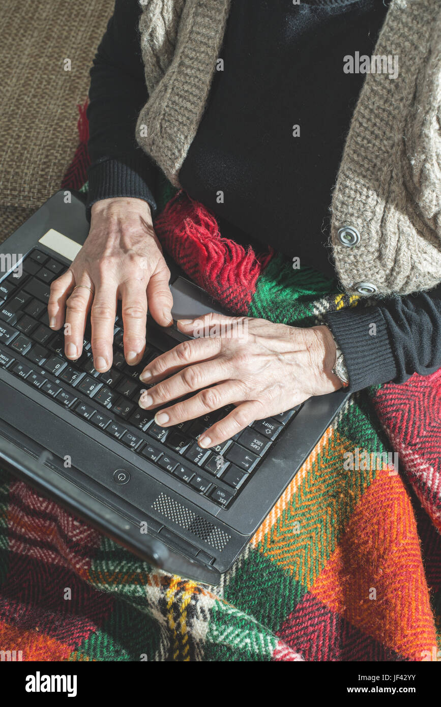 Old women using laptop Stock Photo - Alamy