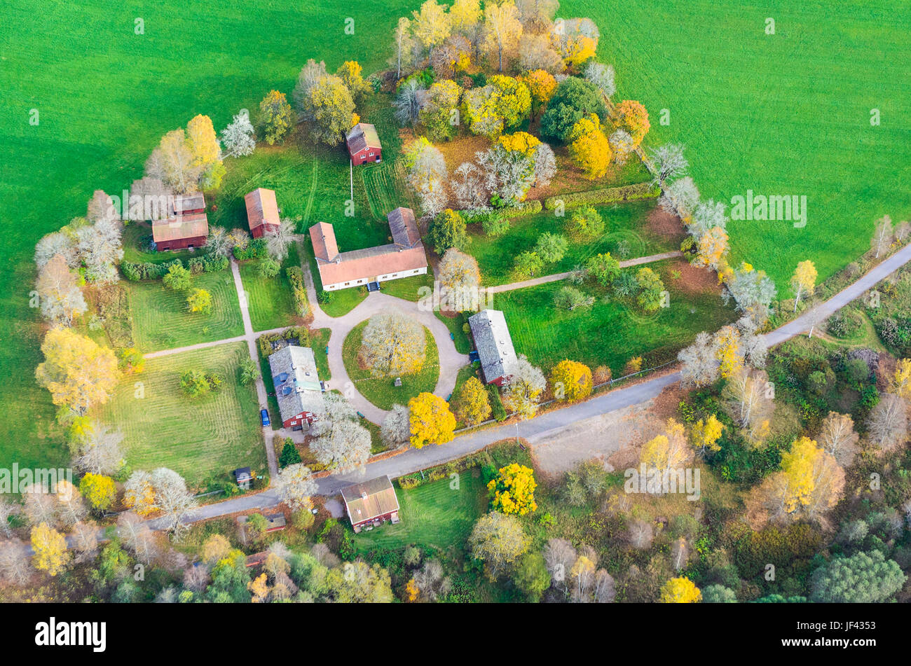 Aerial view of buildings among trees Stock Photo - Alamy