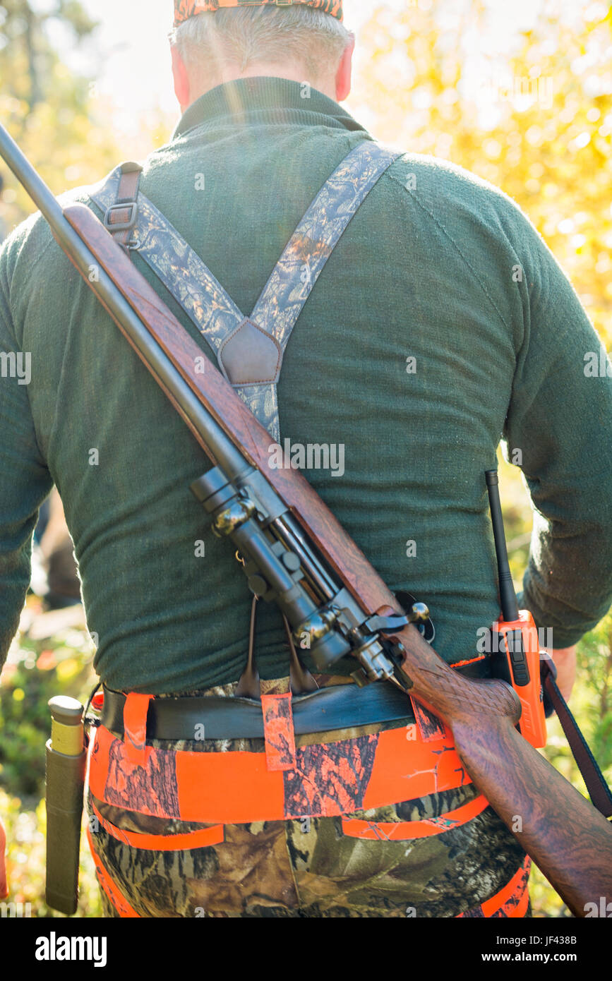 Hunter in forest Stock Photo - Alamy