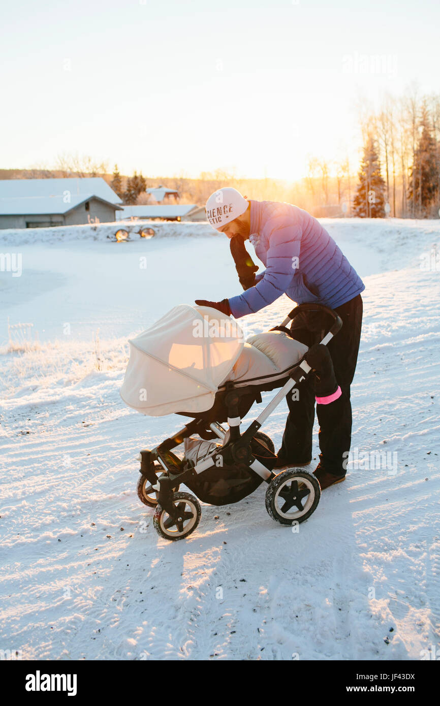 Man walking with buggy Stock Photo - Alamy