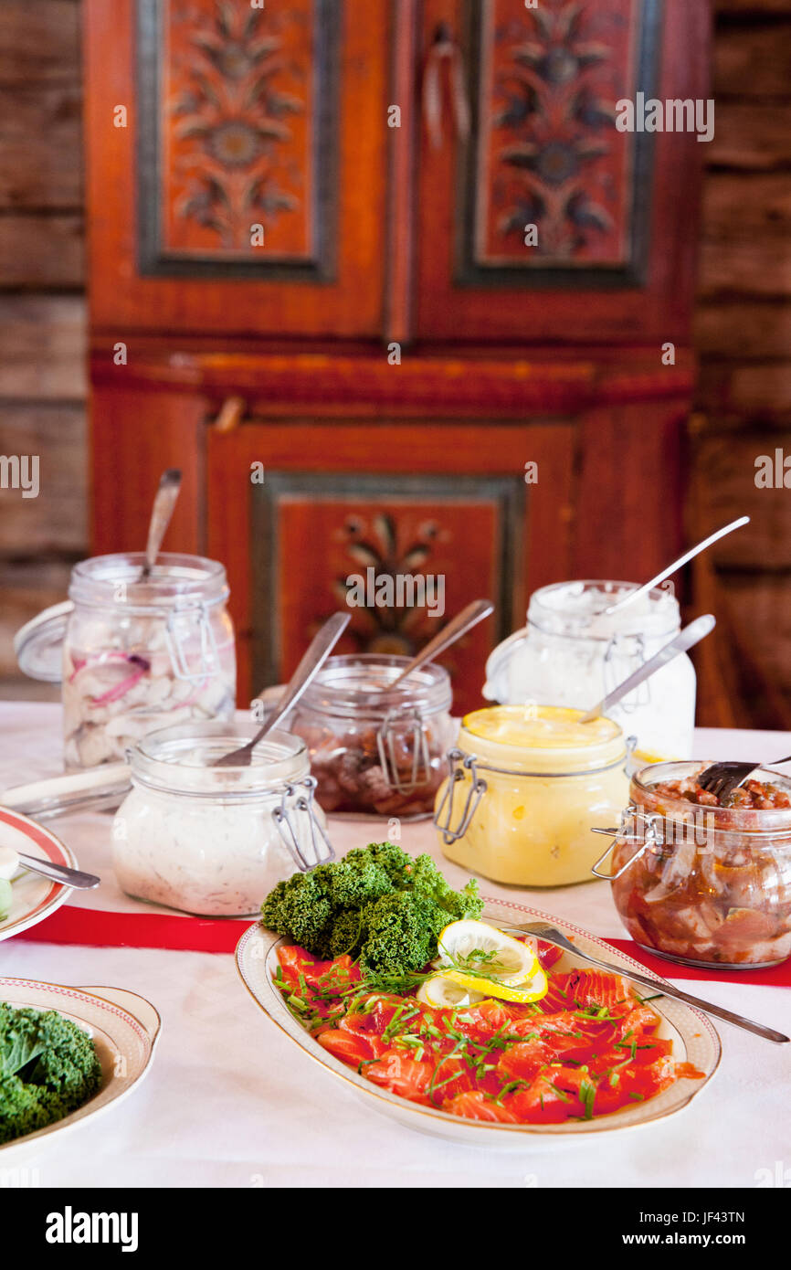 Variety of dishes and appetizers on dining table Stock Photo - Alamy