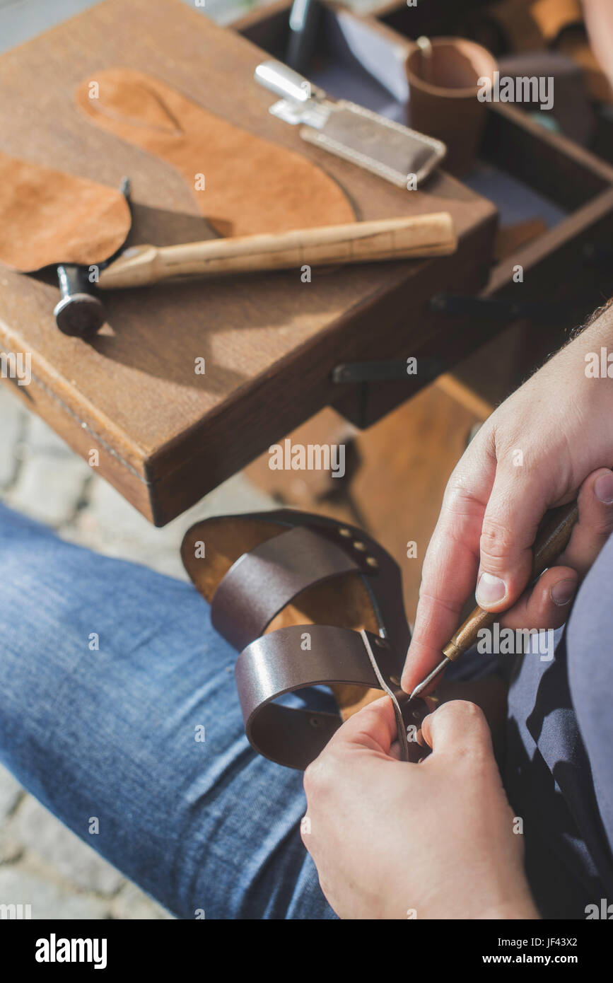 Hands making shoes Stock Photo - Alamy