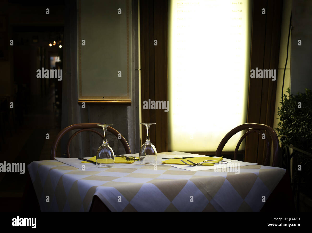 Table in an Italian restaurant Stock Photo - Alamy