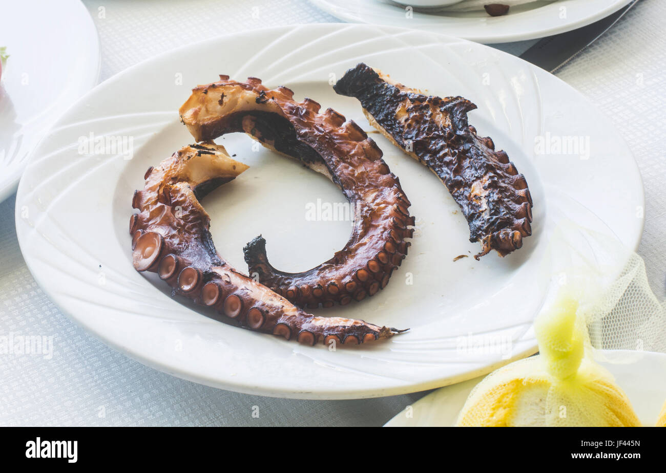 Octopus in a Greek restaurant Stock Photo - Alamy