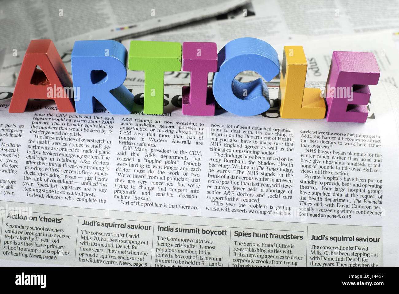 Word article on newspaper Stock Photo - Alamy