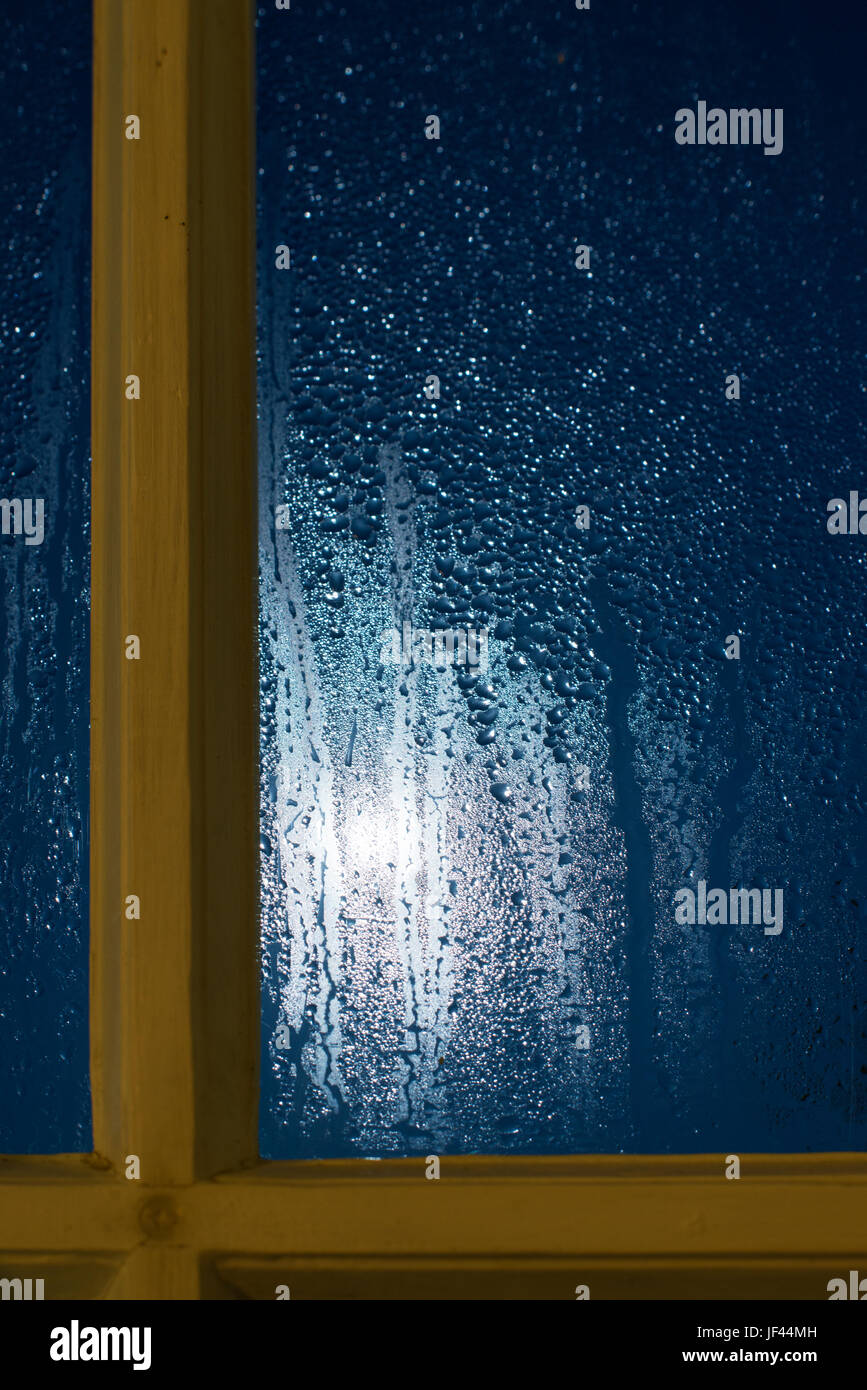 Moonlight through the window Stock Photo - Alamy