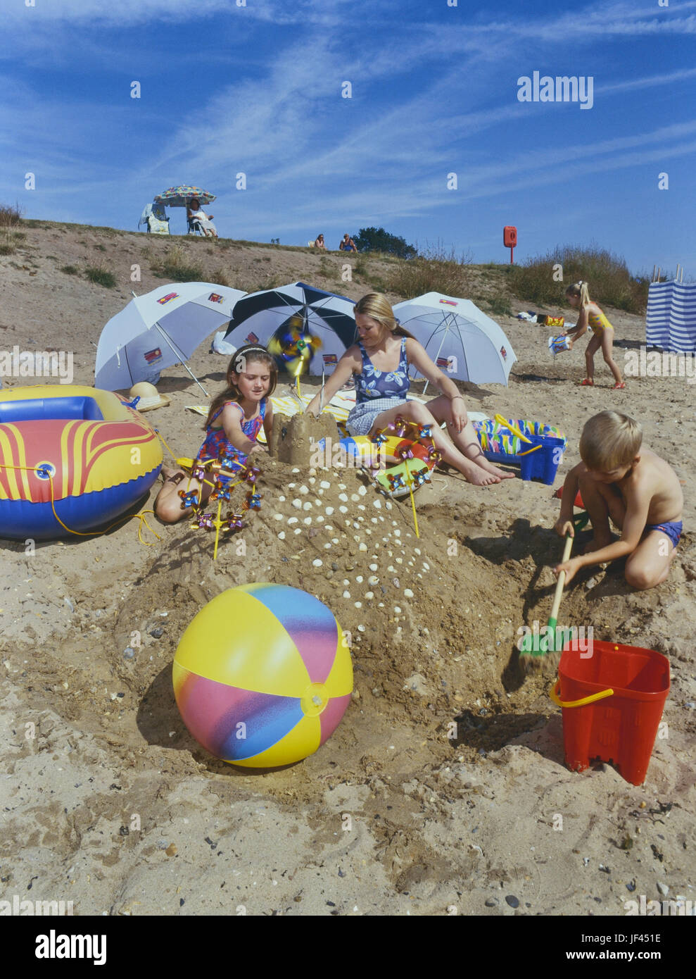 Family on summer beach holiday hi-res stock photography and images - Alamy