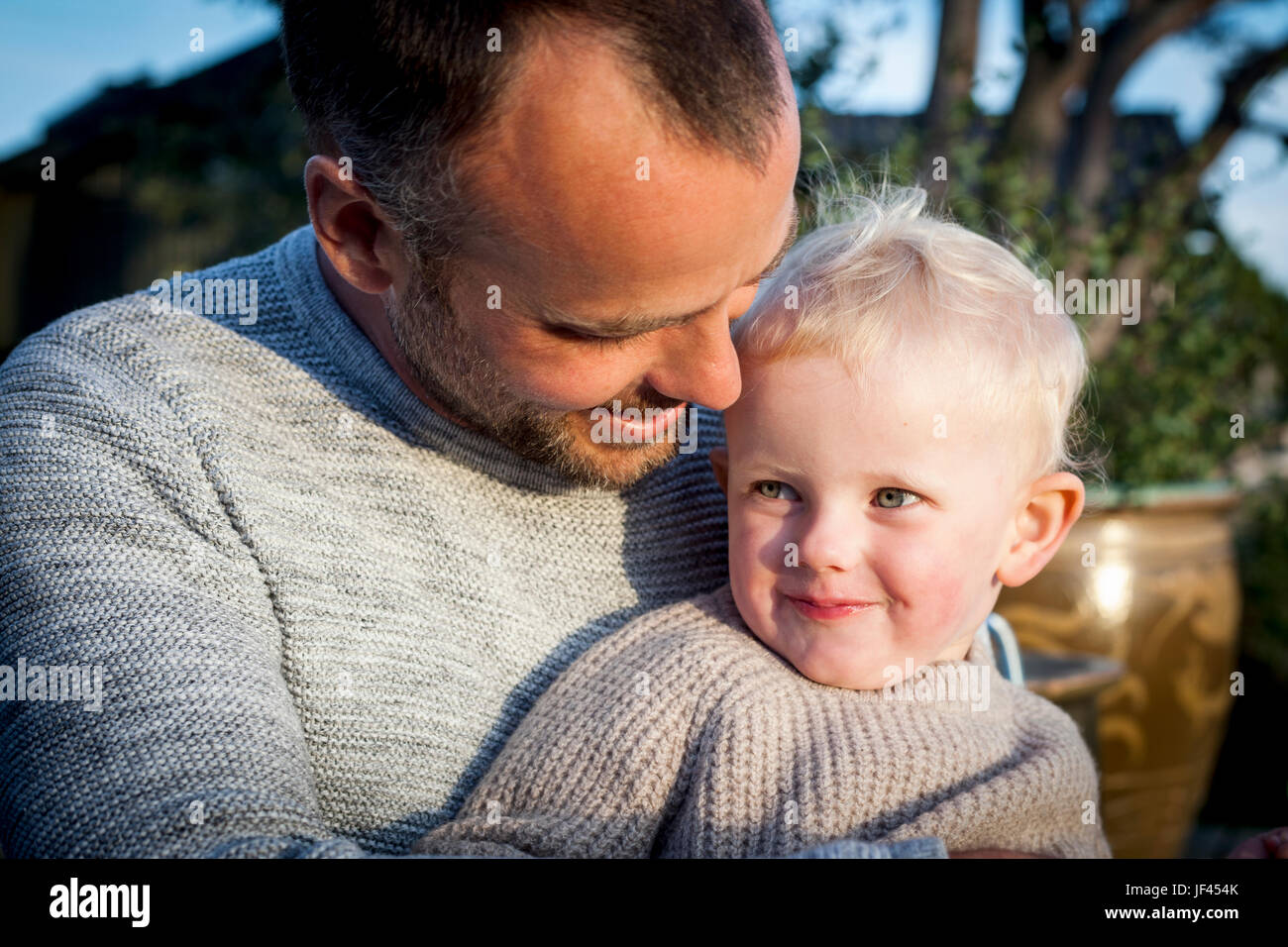 Portrait of father and son Stock Photo - Alamy