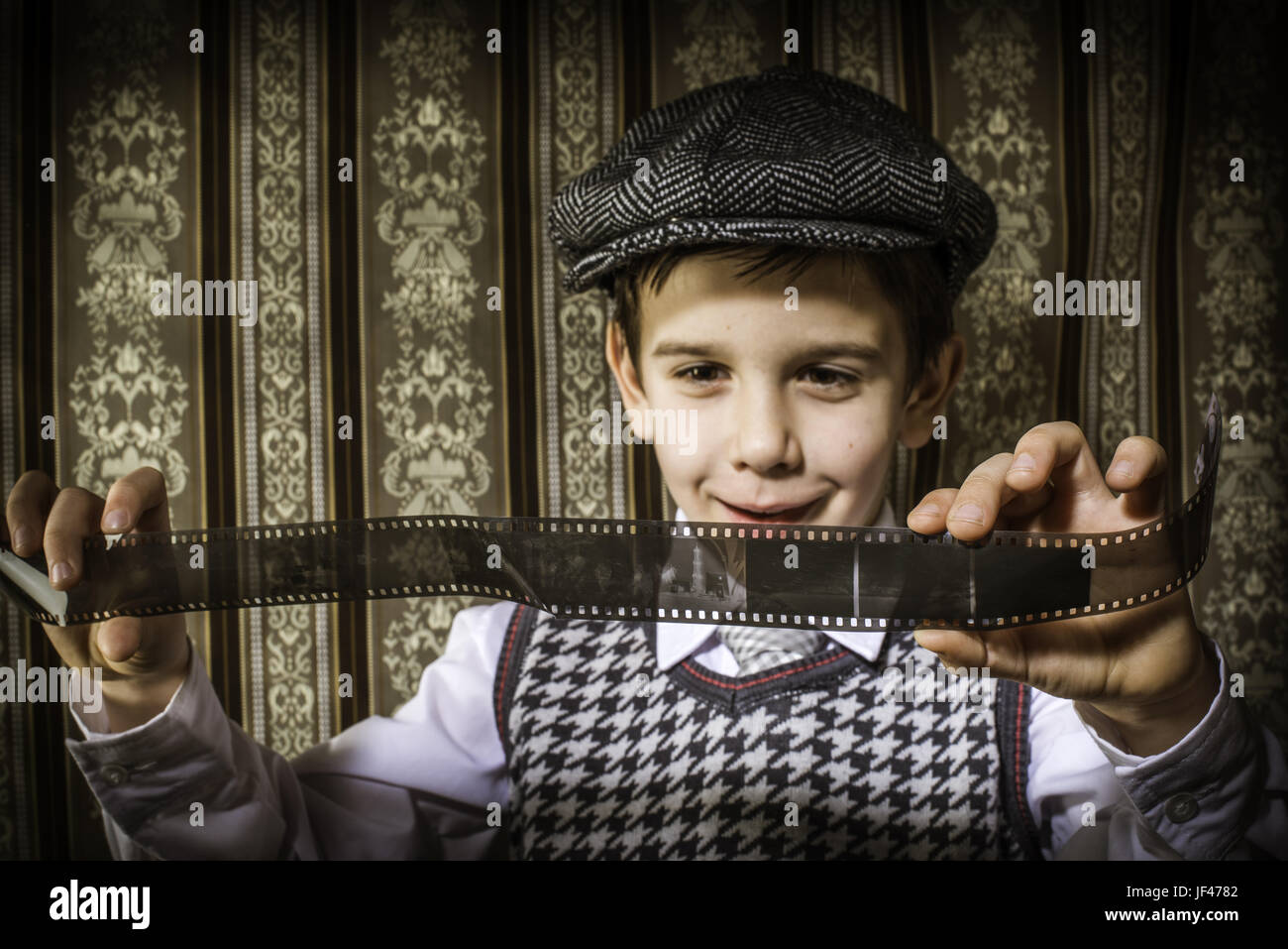 Child considered analog photographic film Stock Photo - Alamy