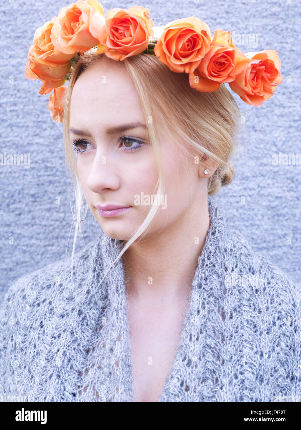 Young woman wearing rose wreath Stock Photo - Alamy