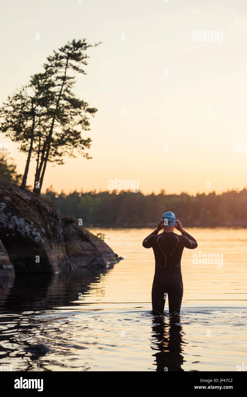 Lake swimmer wetsuit hi-res stock photography and images - Alamy